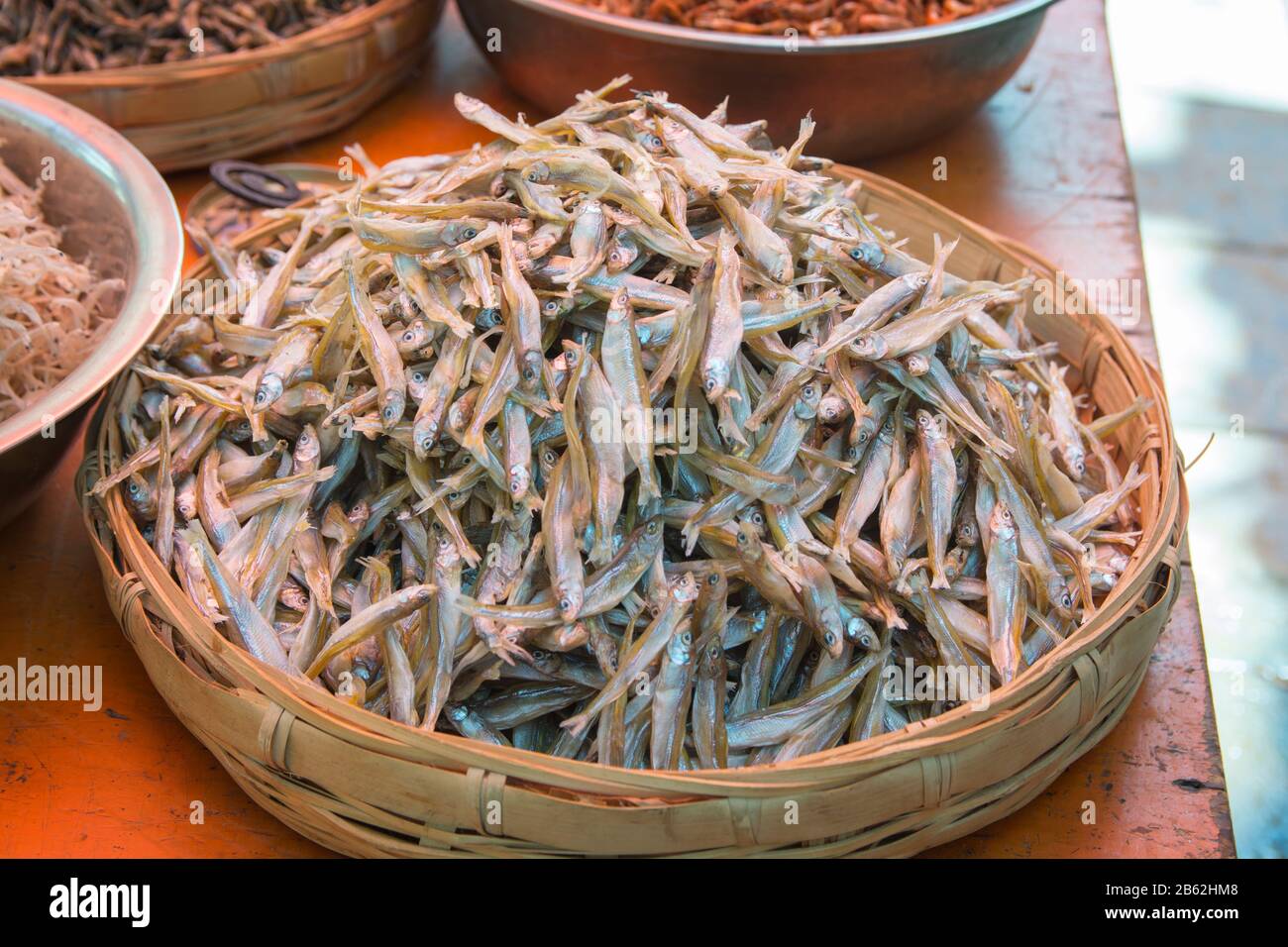 Big pile of fresh Sardines, inside a basket, the market of Dali, Yunnan ...