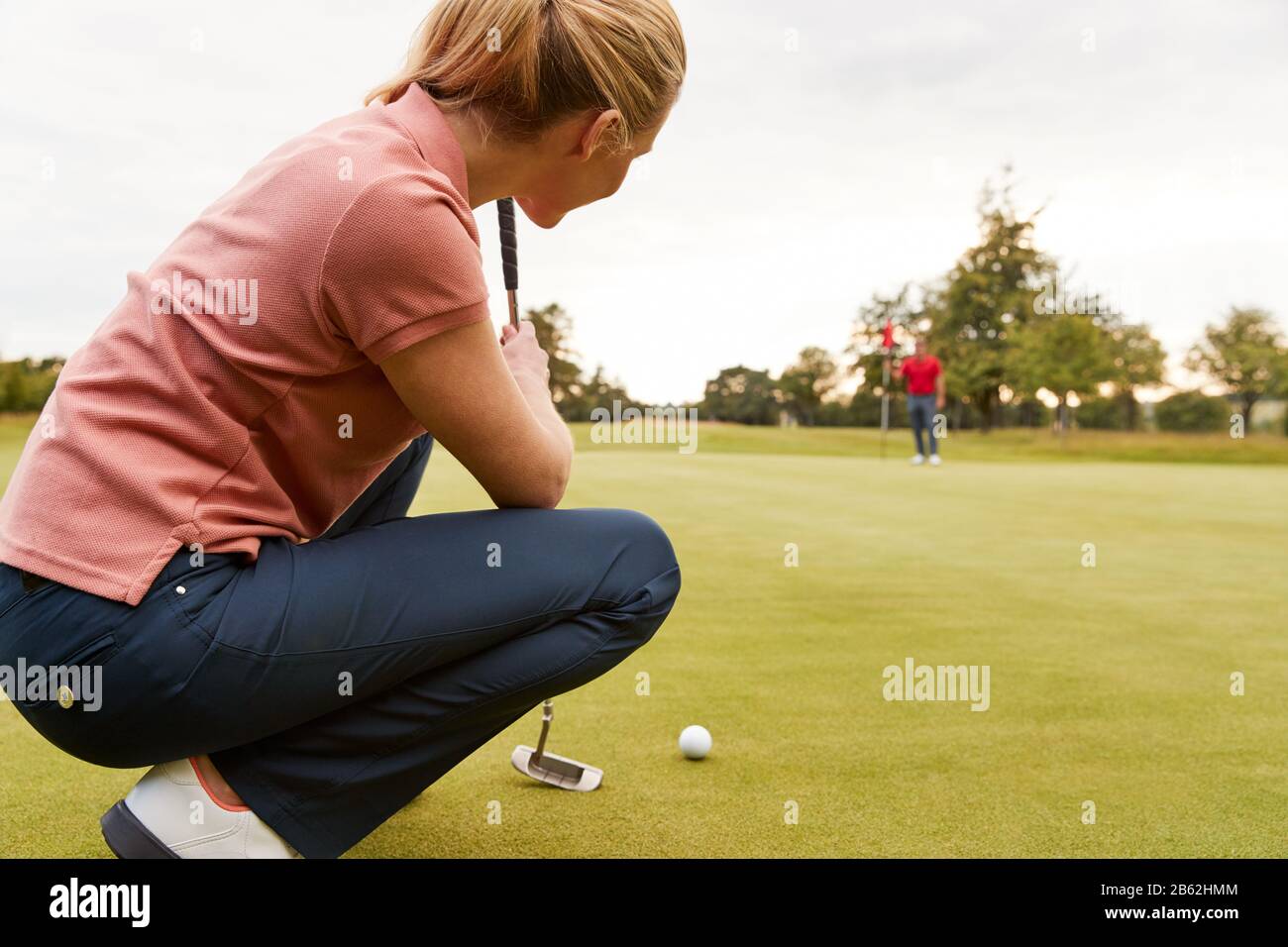 Green putting lining up putt hi-res stock photography and images - Alamy