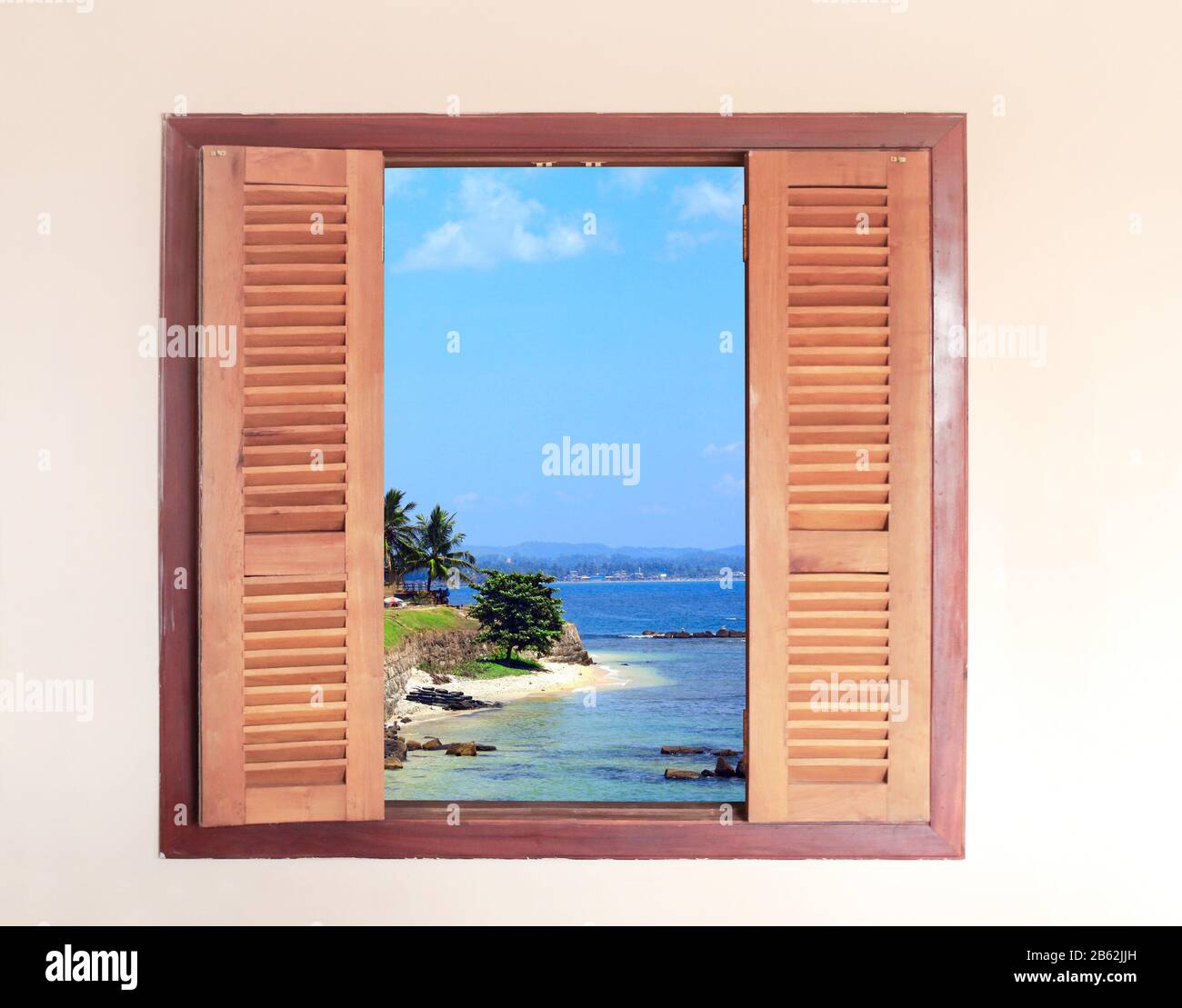 View of ocean through window with wooden shutters. Sea view room ...