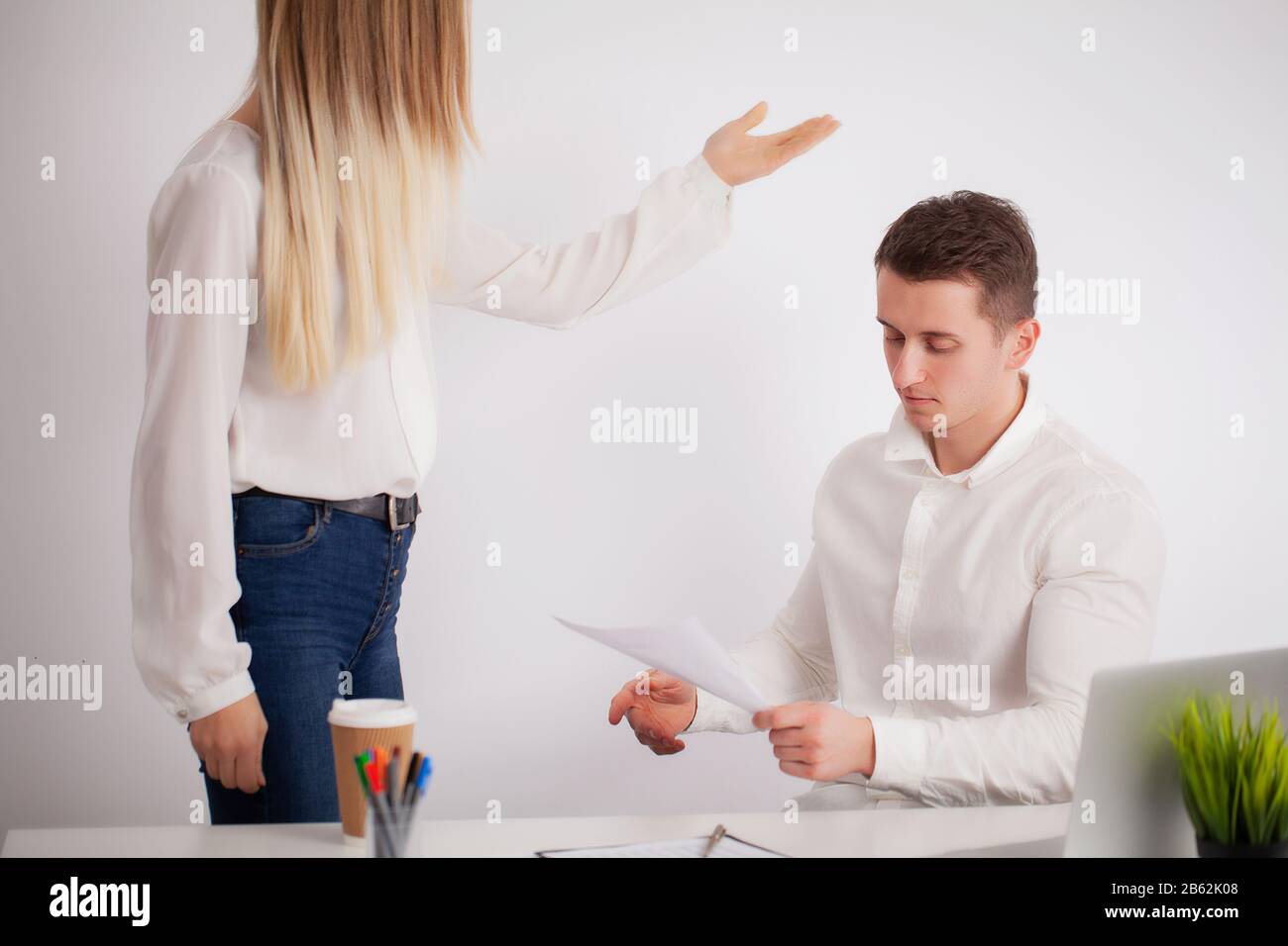 Angry customer has a conflict with the manager of the company Stock ...