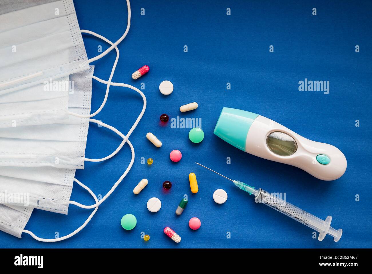 Medicine concept, pill, tablet, medical thermometer, bandage, syringe ...