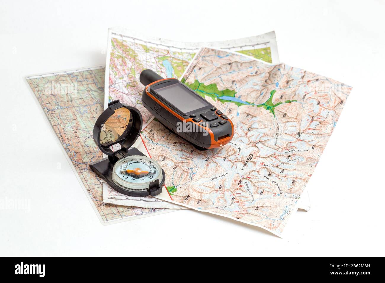 GPS navigator and compass isolated on white background Stock Photo - Alamy