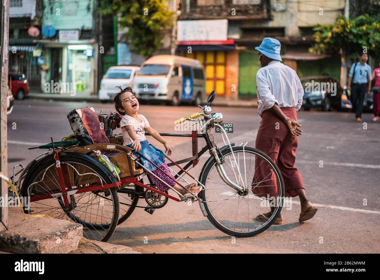 Girl on the rickshaw, Yangon, Myanmar, Asia Stock Photo - Alamy