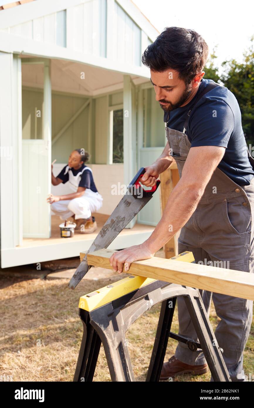 Sawing timber garden hi-res stock photography and images - Alamy