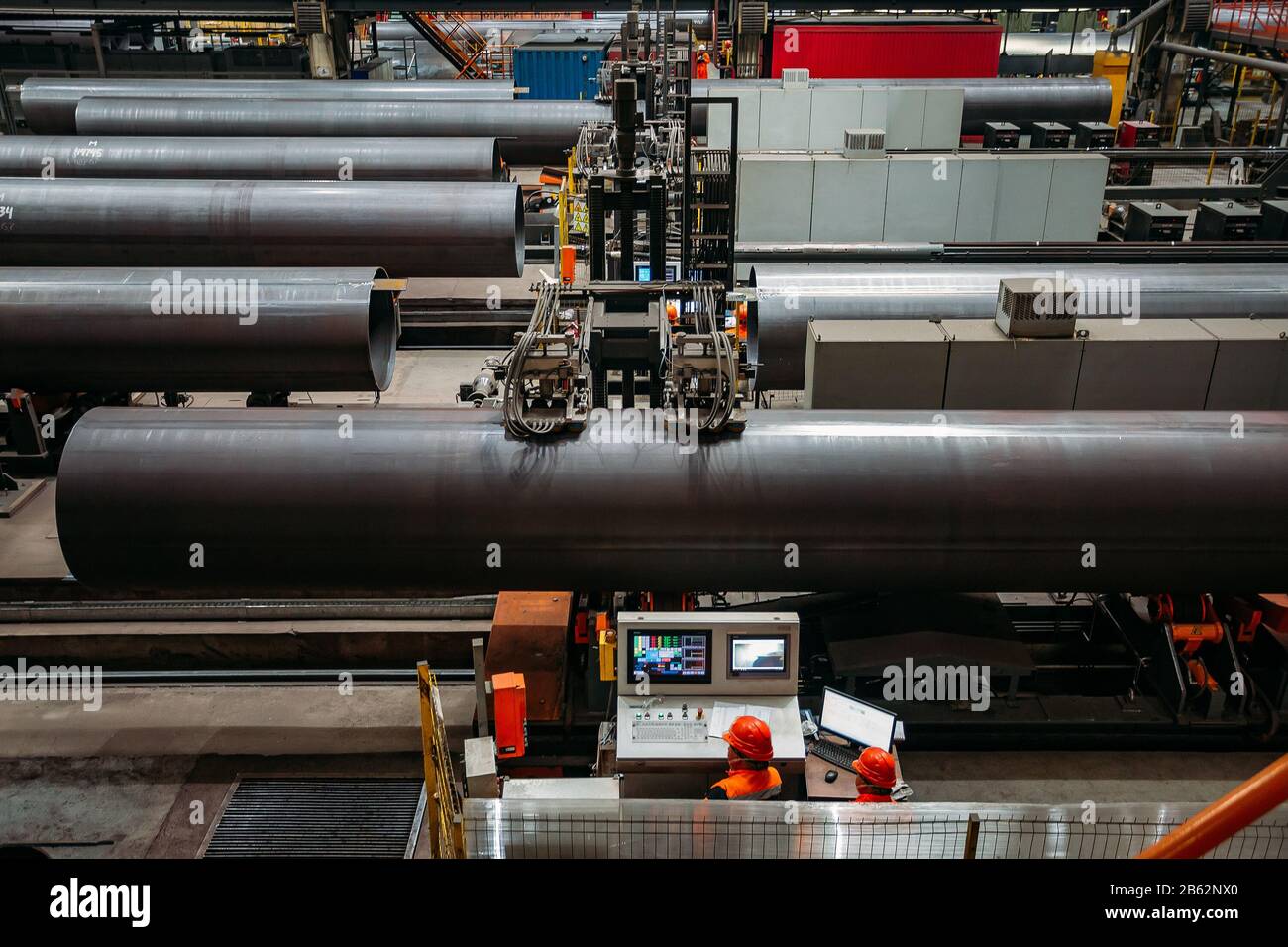 Steel pipe internal seam welding by longitudinal tack welding machine ...