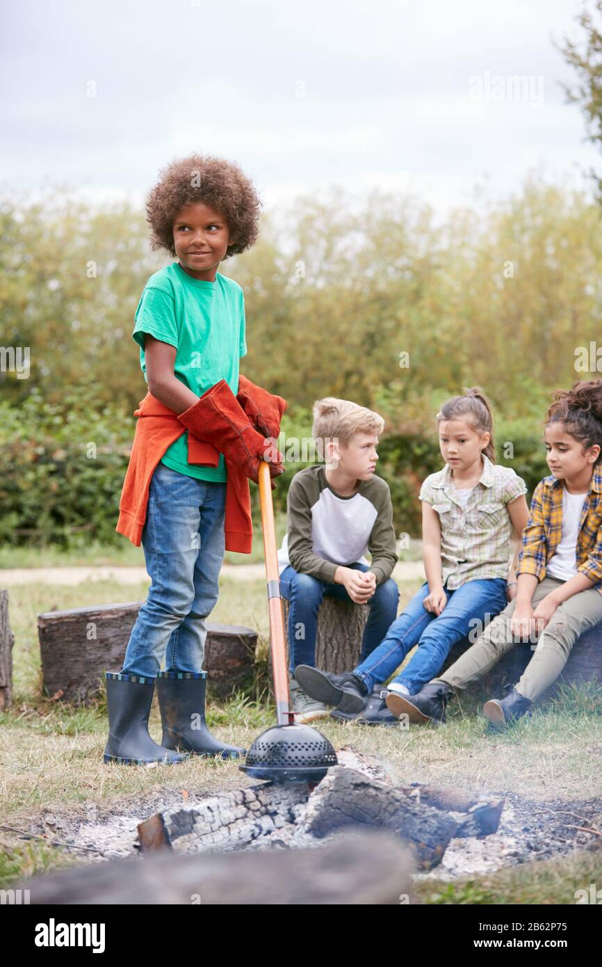 Cooking outdoor fire child hi-res stock photography and images - Alamy