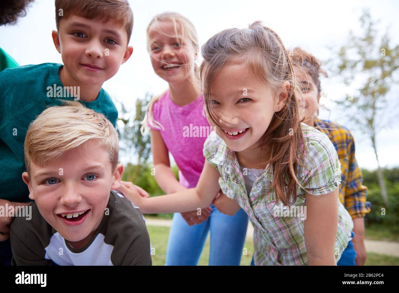 Portrait Of Children On Outdoor Activity Camping Trip Having Fun ...