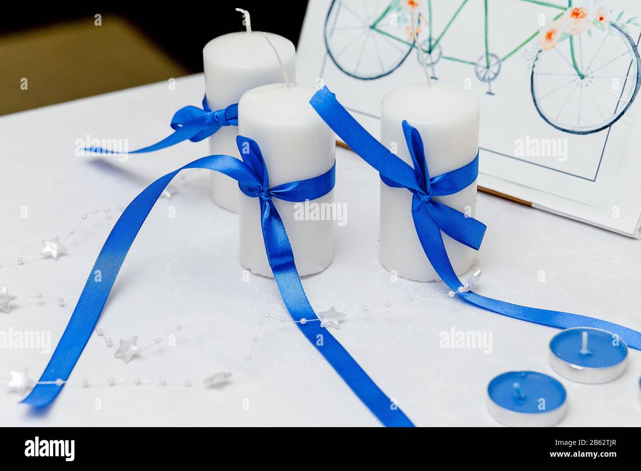 blue candles at wedding Stock Photo - Alamy