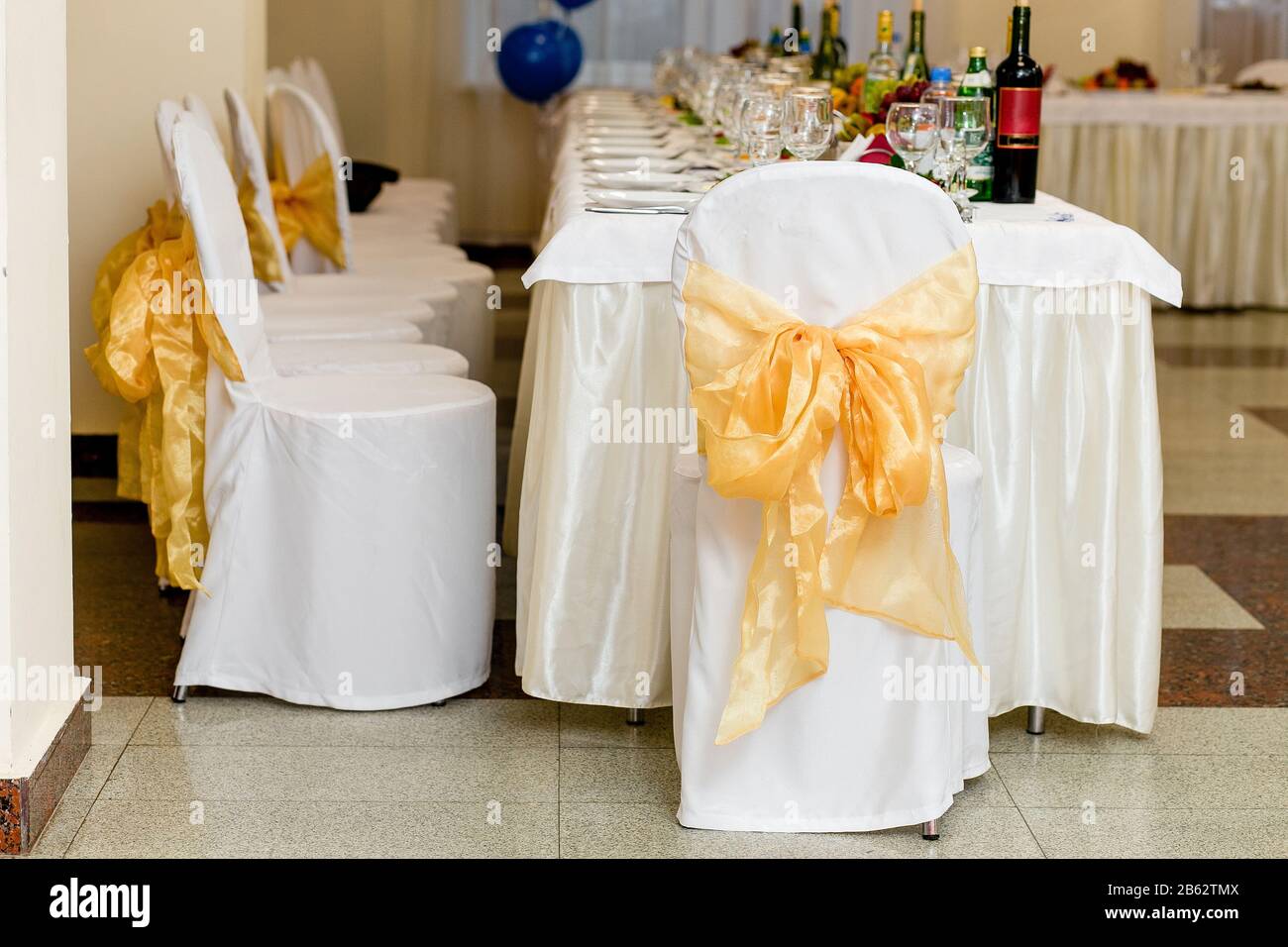 wedding chairs with silk ribbons Stock Photo - Alamy