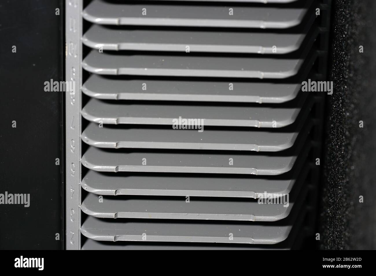 Old slide projector with slide frame photographed in the studio with ...