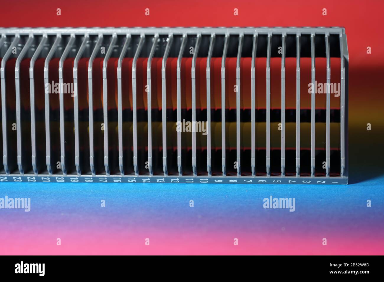 Old slide projector with slide frame photographed in the studio with ...
