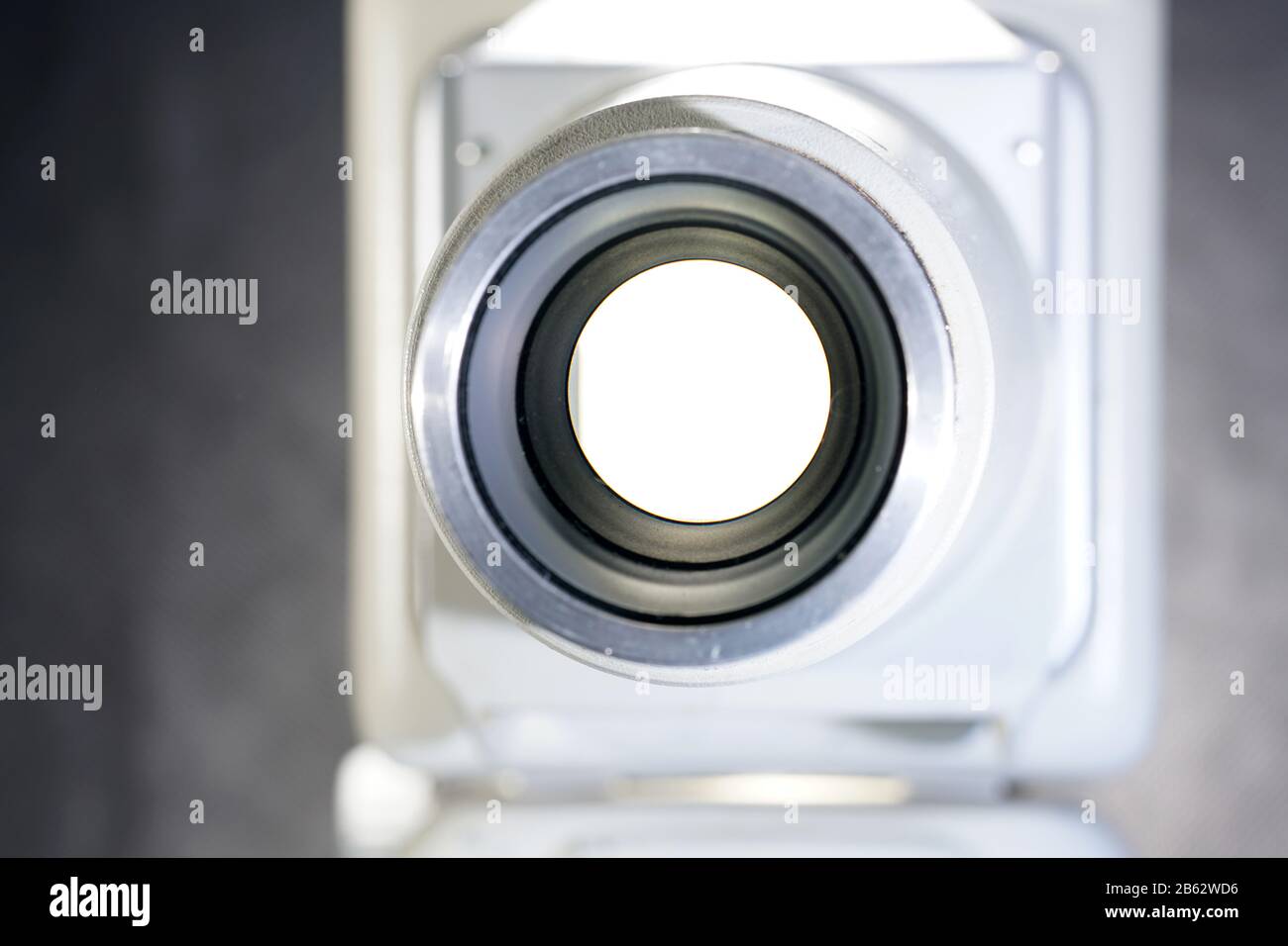 Old slide projector with slide frame photographed in the studio with ...