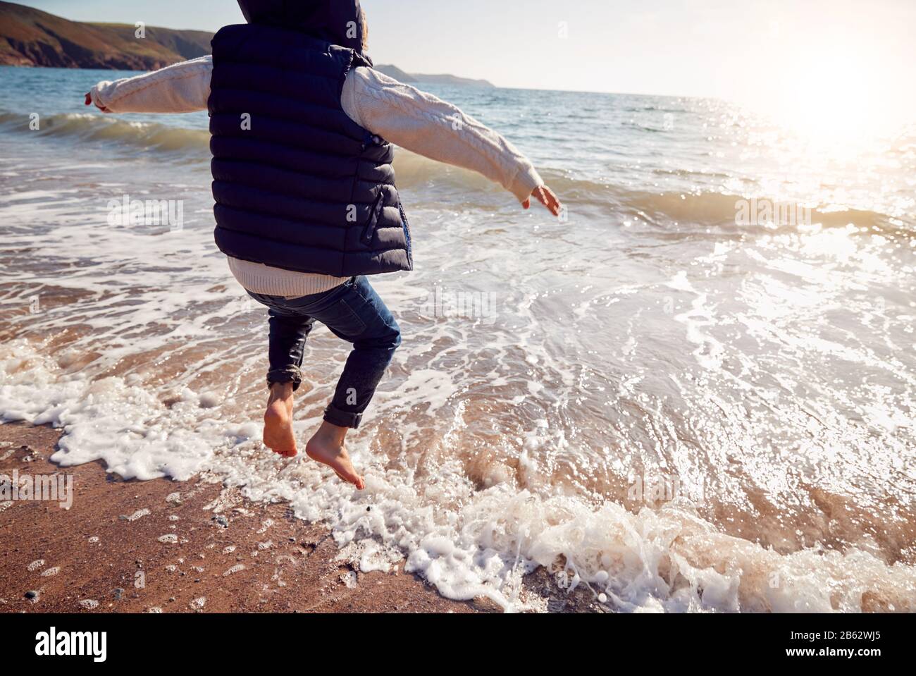 Old person beach jumping hi-res stock photography and images - Alamy
