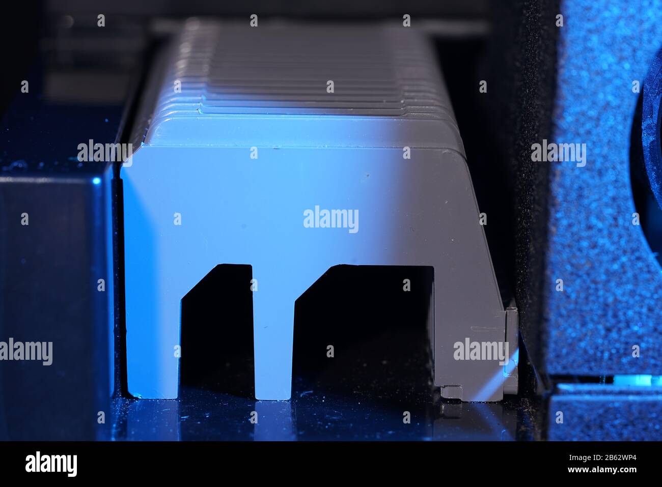 Old slide projector with slide frame photographed in the studio with ...