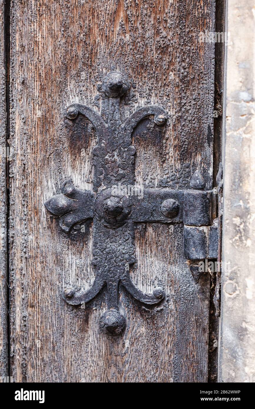 Old medieval door iron hinge closeup Stock Photo - Alamy