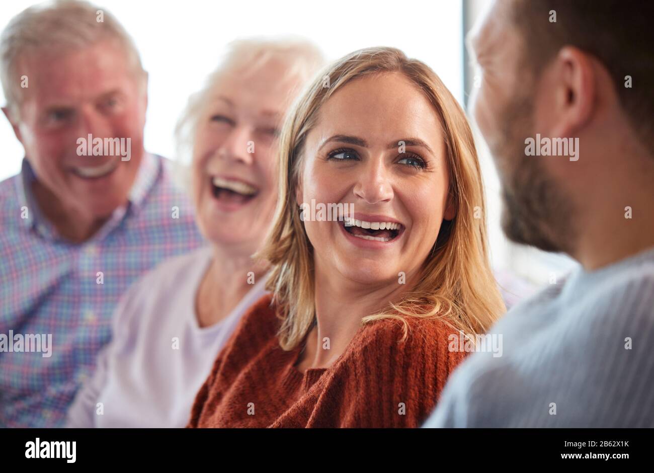 Senior parents adult offspring sitting hi-res stock photography and ...