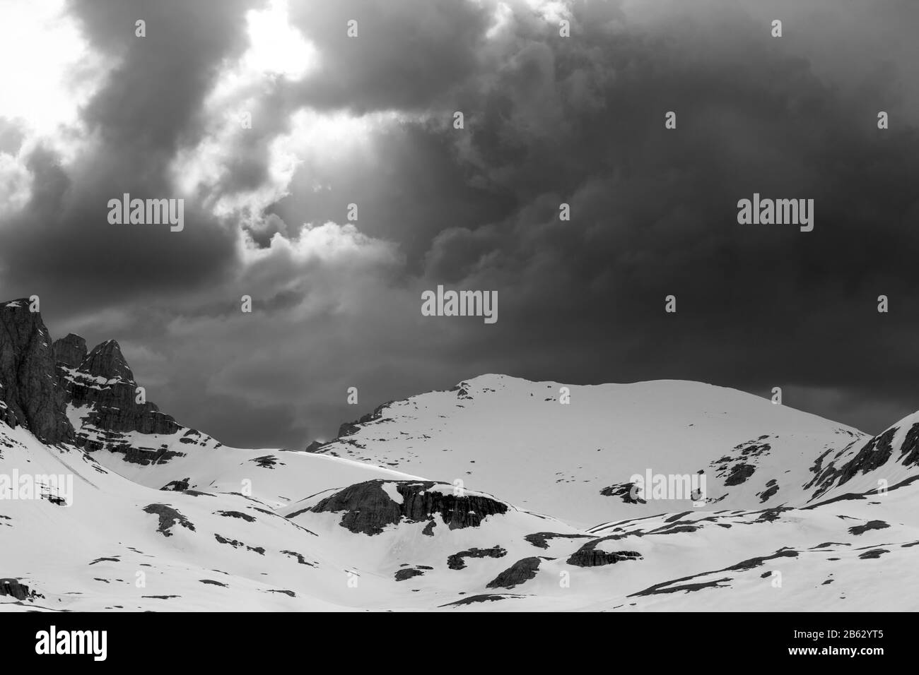 Snowy mountains and storm clouds at high winter mountains. Turkey ...