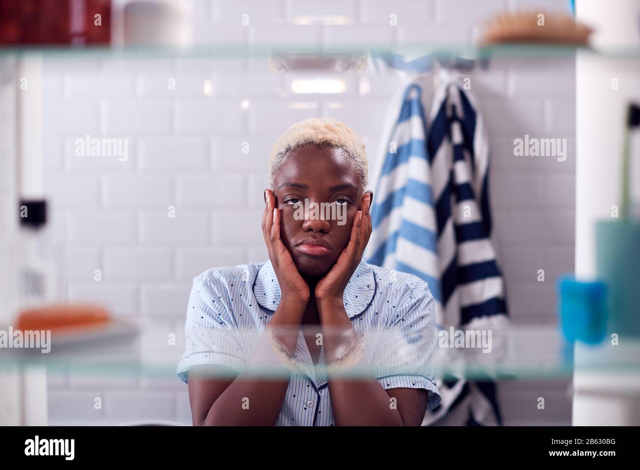 View Through Bathroom Cabinet Of Unhappy Young Woman Getting Ready For ...