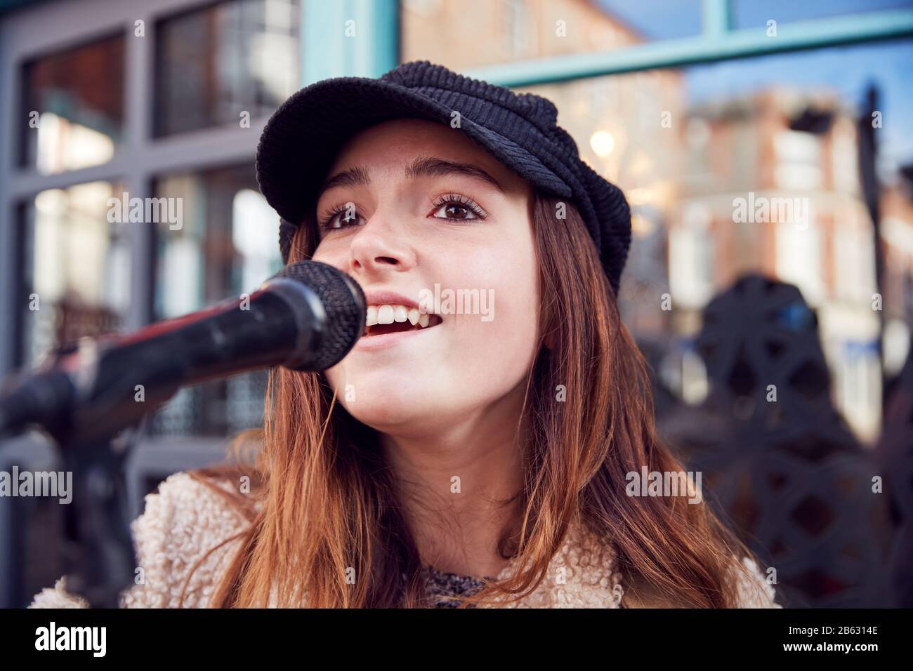 Women busking in the street hi-res stock photography and images - Alamy