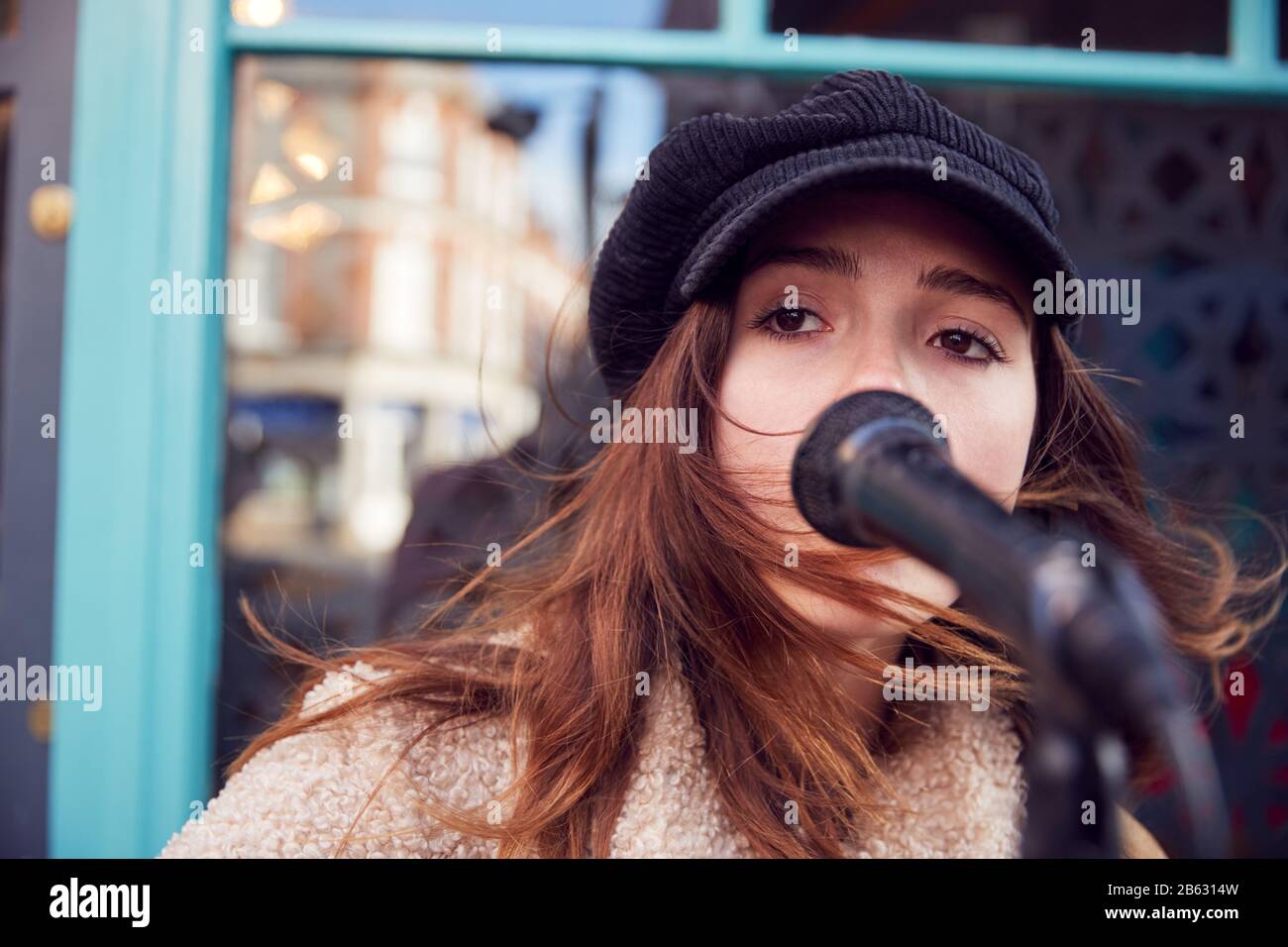 Women busking in the street hi-res stock photography and images - Alamy