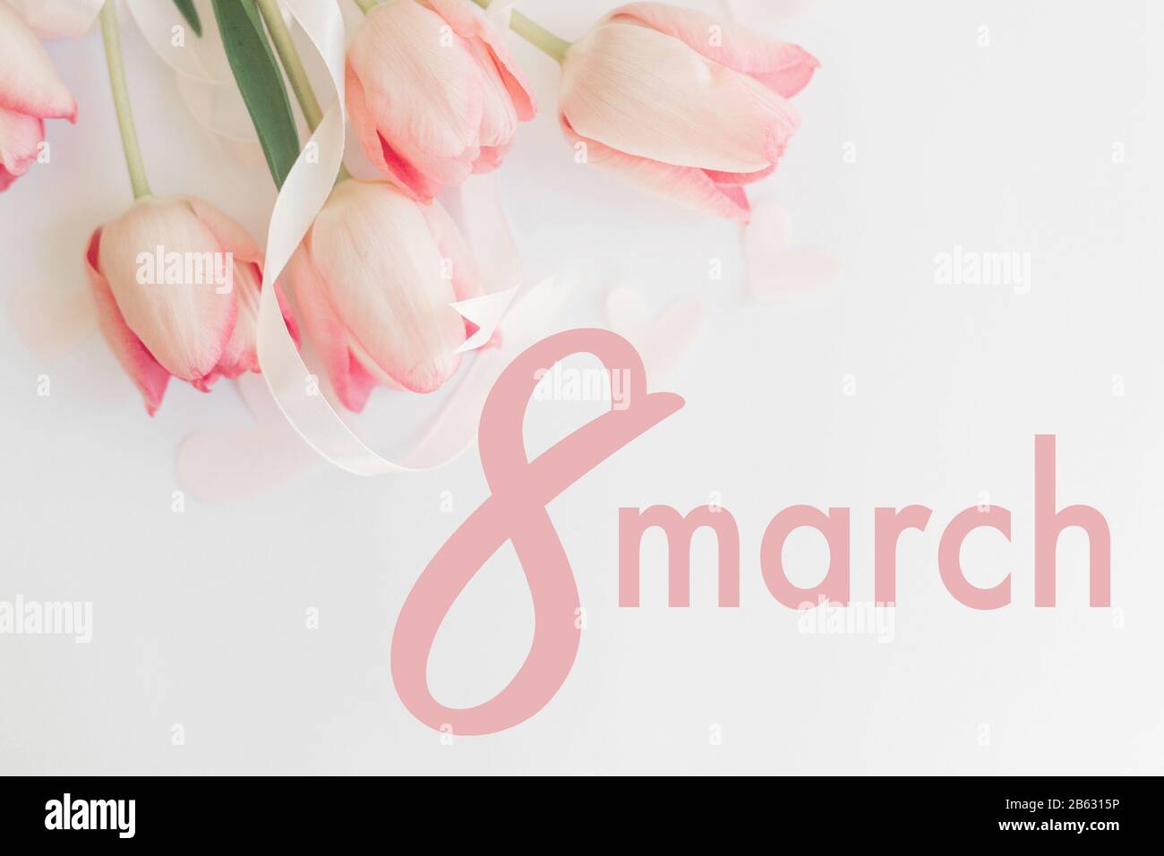 8 march. Happy womens day greeting card. 8 march text on pink tulips ...