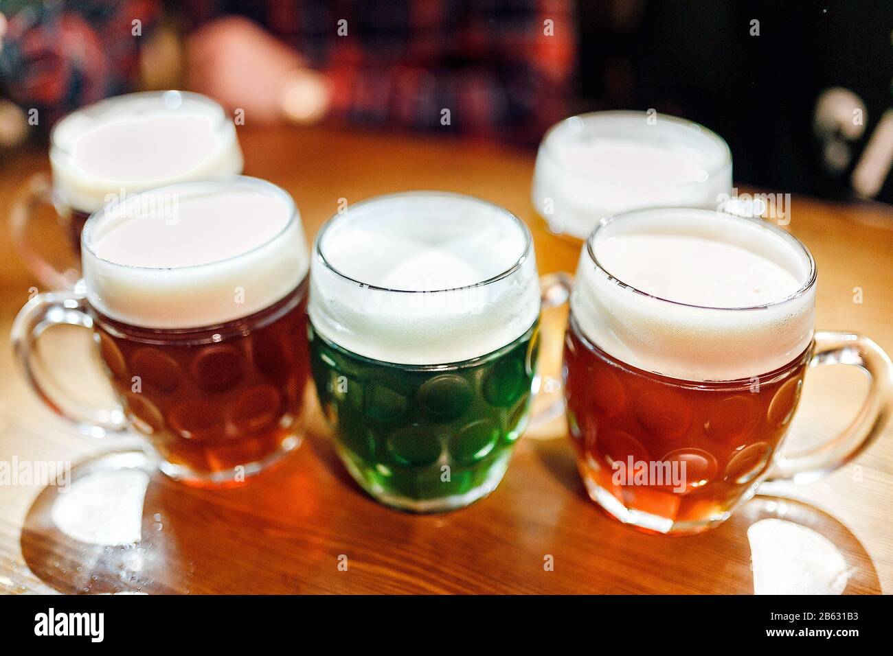 Five authentic crafted mugs of Czech beer in the Prague pub on the ...