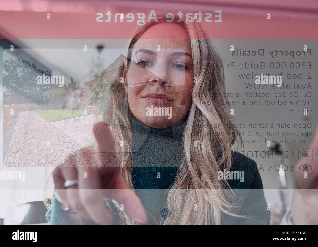 Woman looking into mobile from behind hi-res stock photography and ...