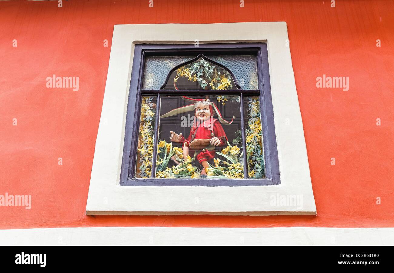 fairy tale window with puppet doll inside Stock Photo - Alamy