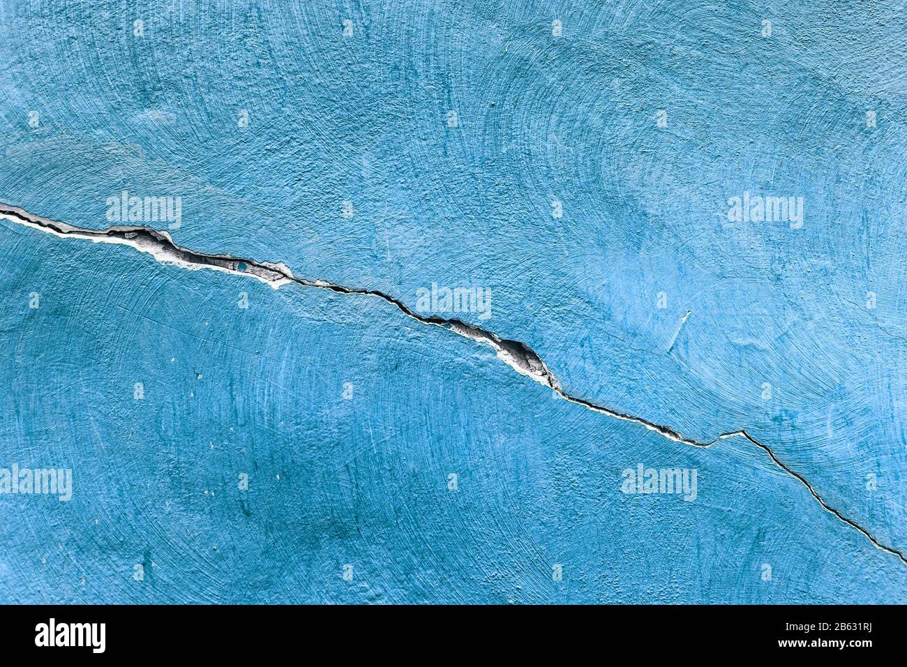 Texture of a blue painted wall with a crack Stock Photo - Alamy