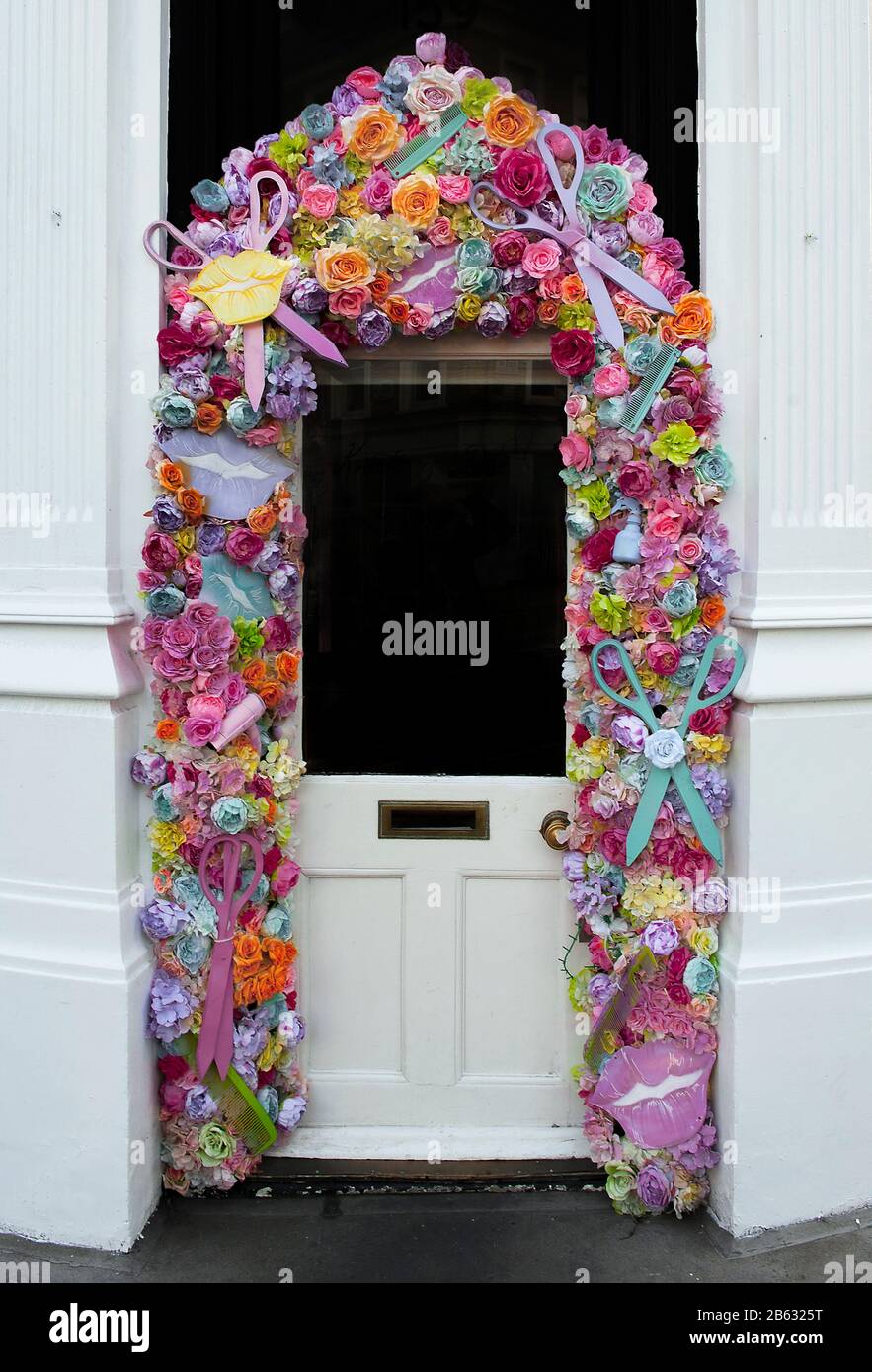 Yellow flowers around entrance door hi-res stock photography and images ...
