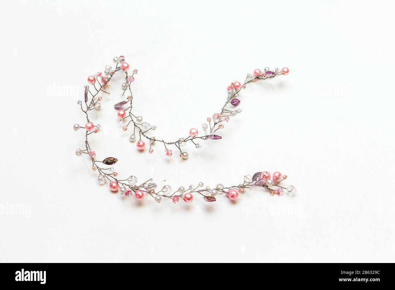 Diamond or pearl diadem on a white background isolated Stock Photo - Alamy