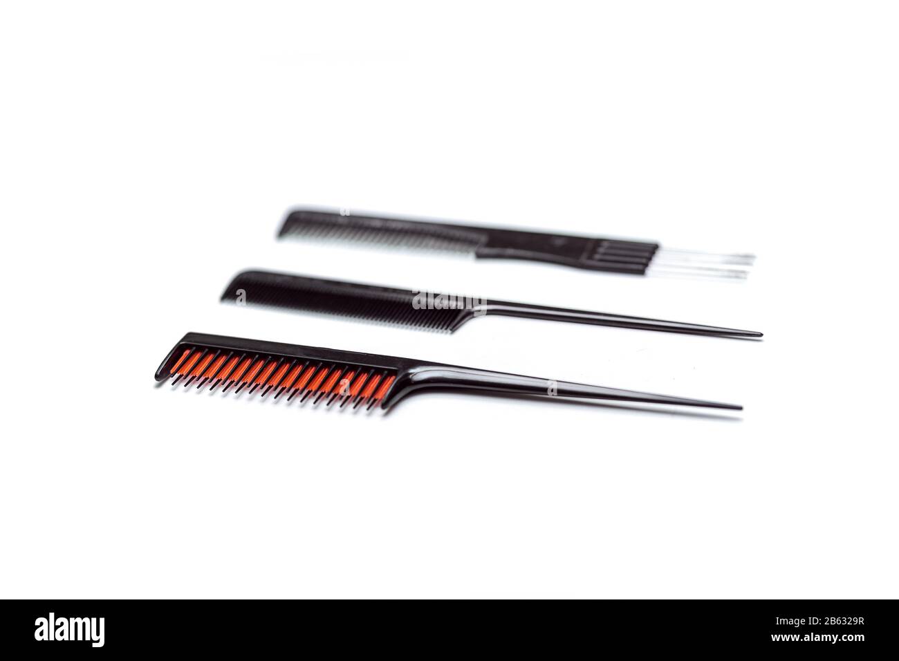 Modern professional combs of different styles over white background ...