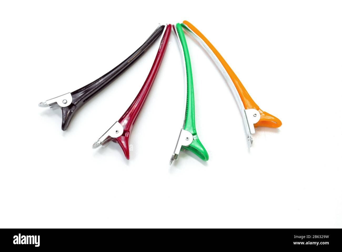 Colored hair clips isolated on white background Stock Photo - Alamy