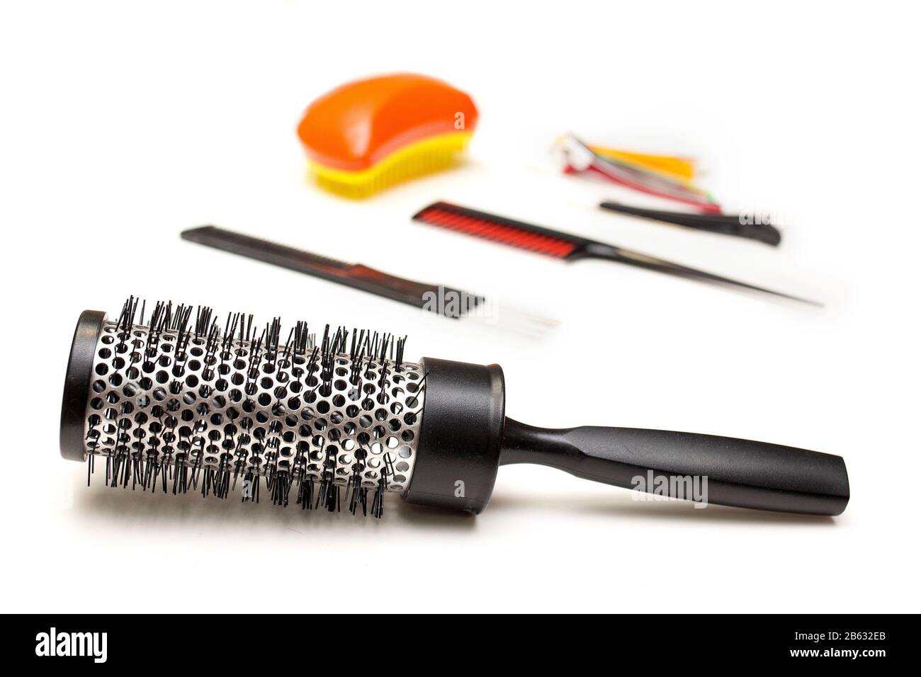 Modern professional combs of different styles over white background ...