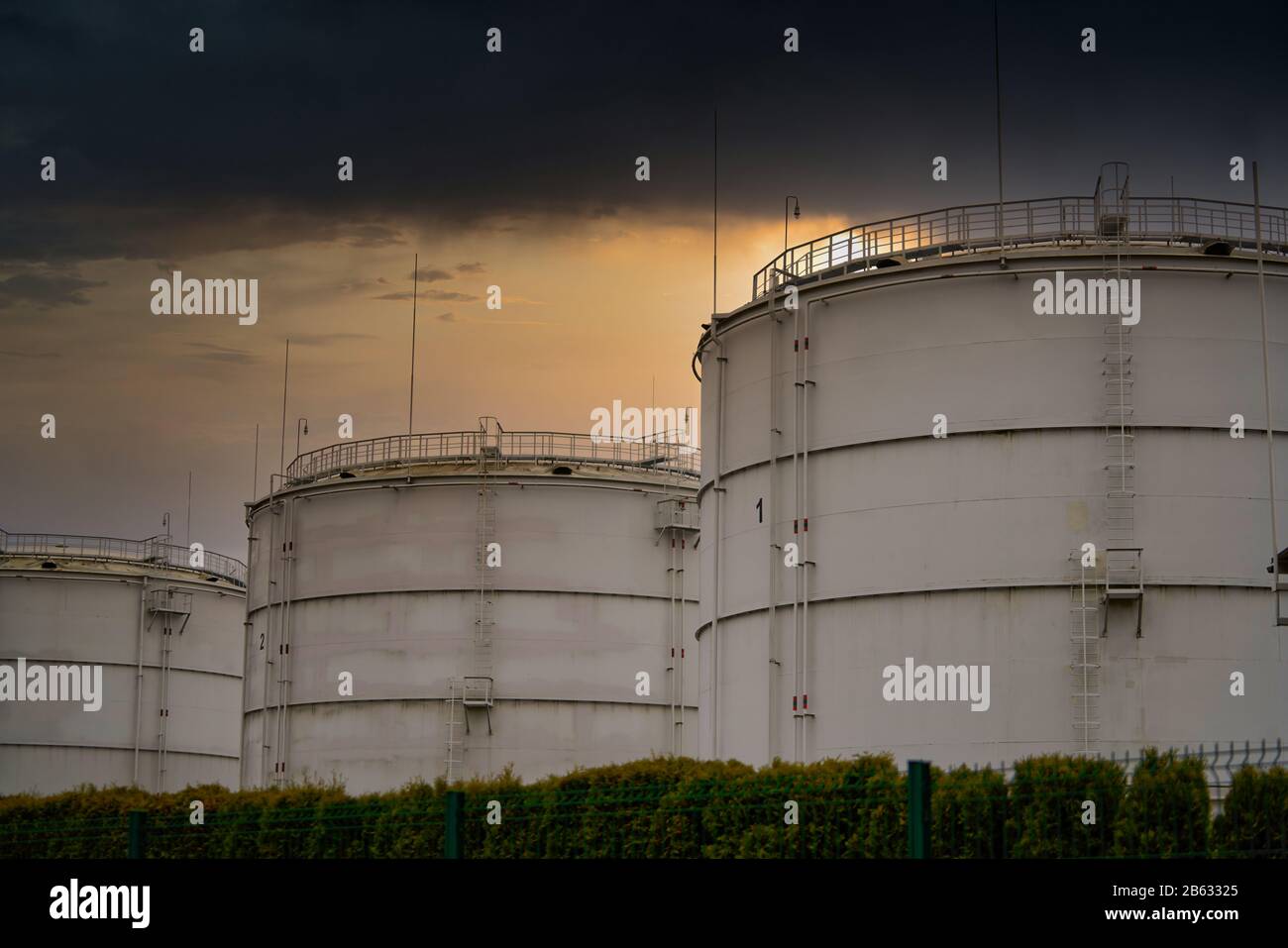 Big industrial oil tanks in a refinery base Stock Photo - Alamy