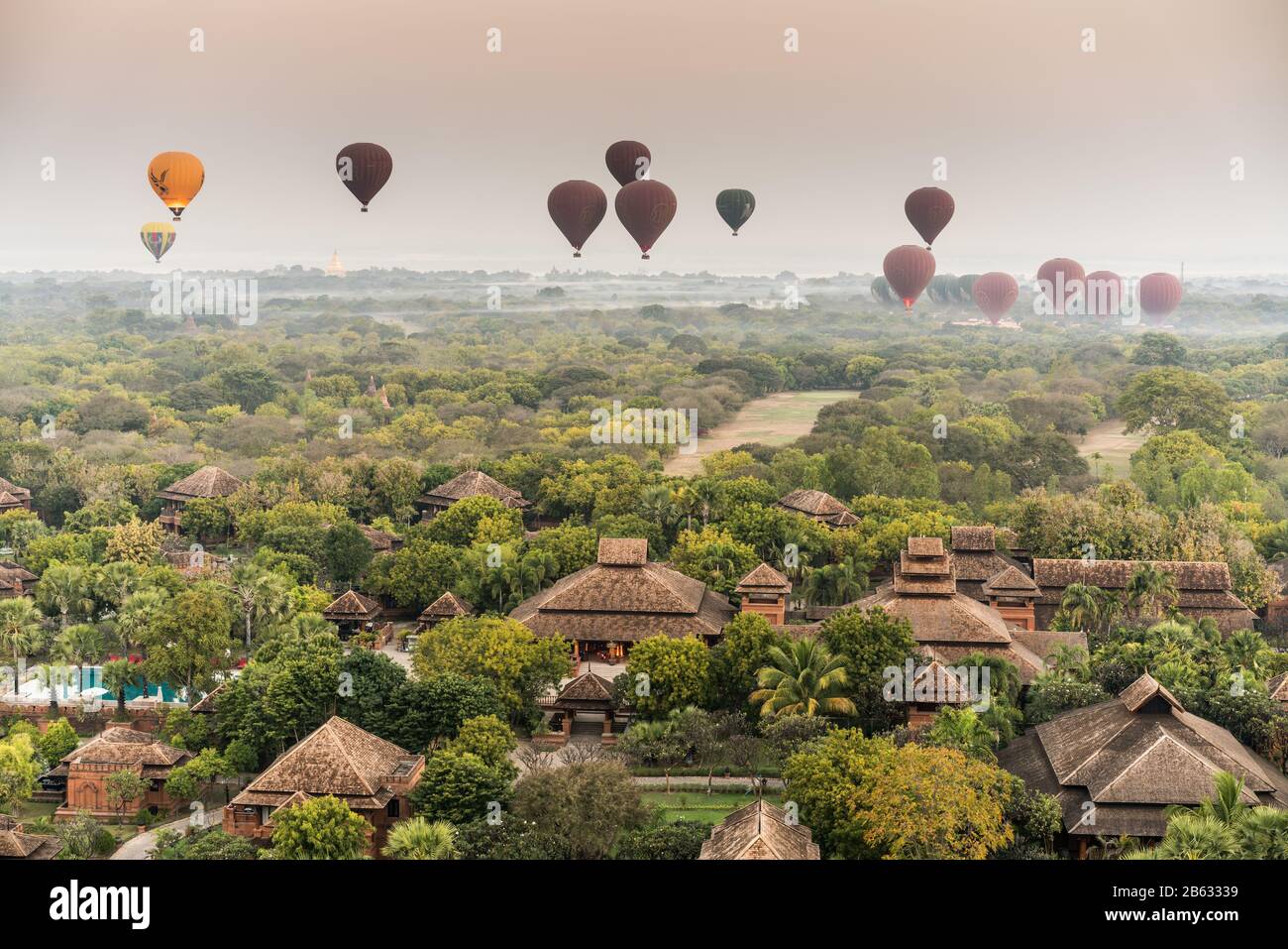 hot air balloons over landscape with Bagan temples, Myanmar, Asia Stock ...