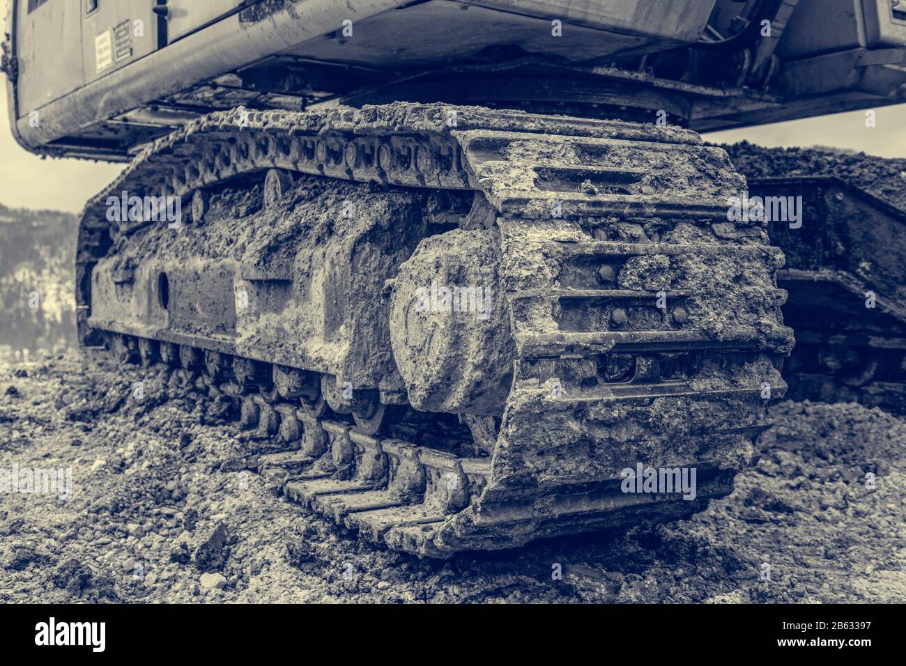 Tracks of a excavator machine on a construction site Stock Photo - Alamy