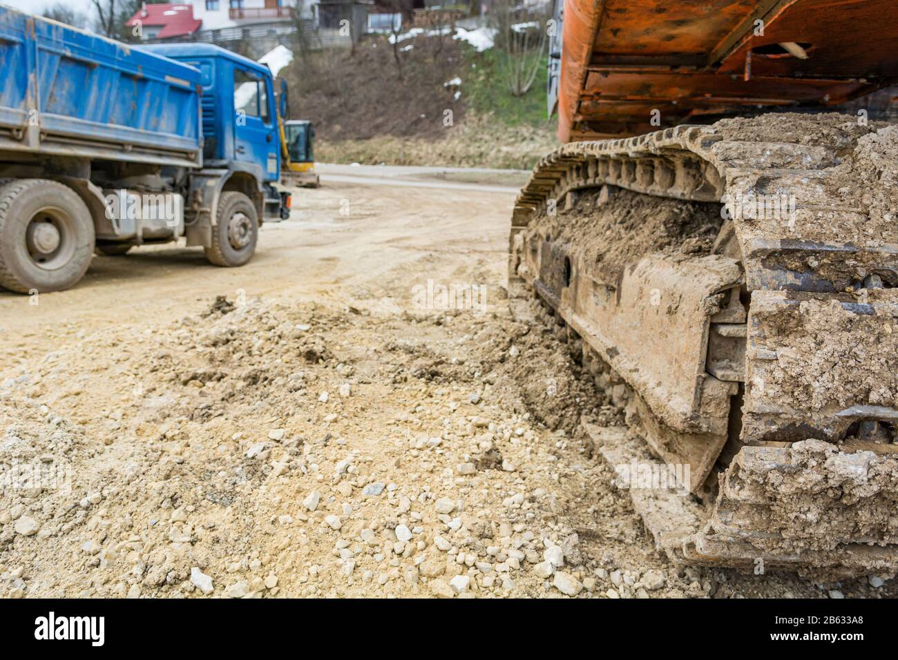 Tracks of a excavator machine on a construction site Stock Photo - Alamy