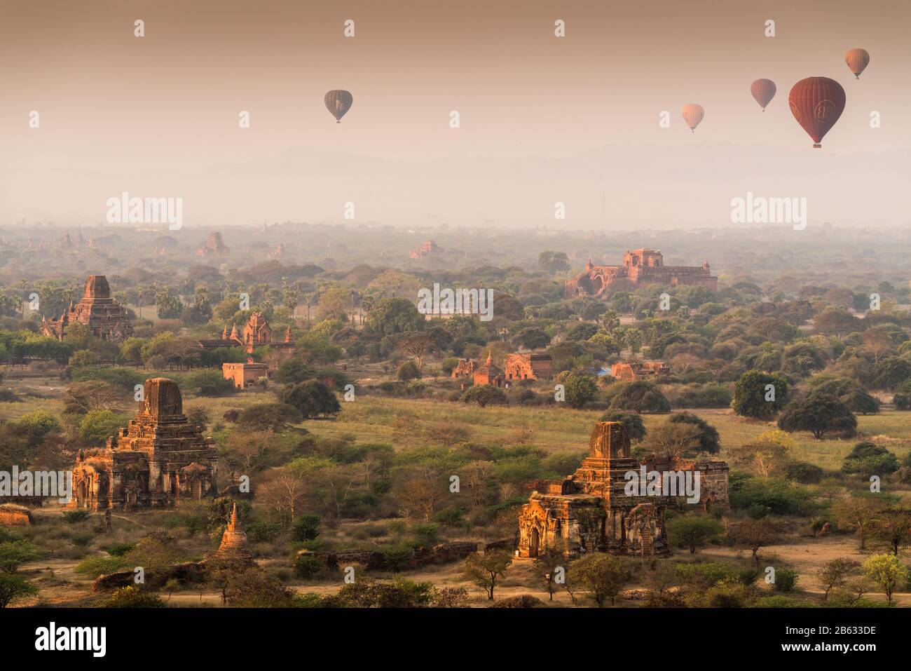 hot air balloons over landscape with Bagan temples, Myanmar, Asia Stock ...