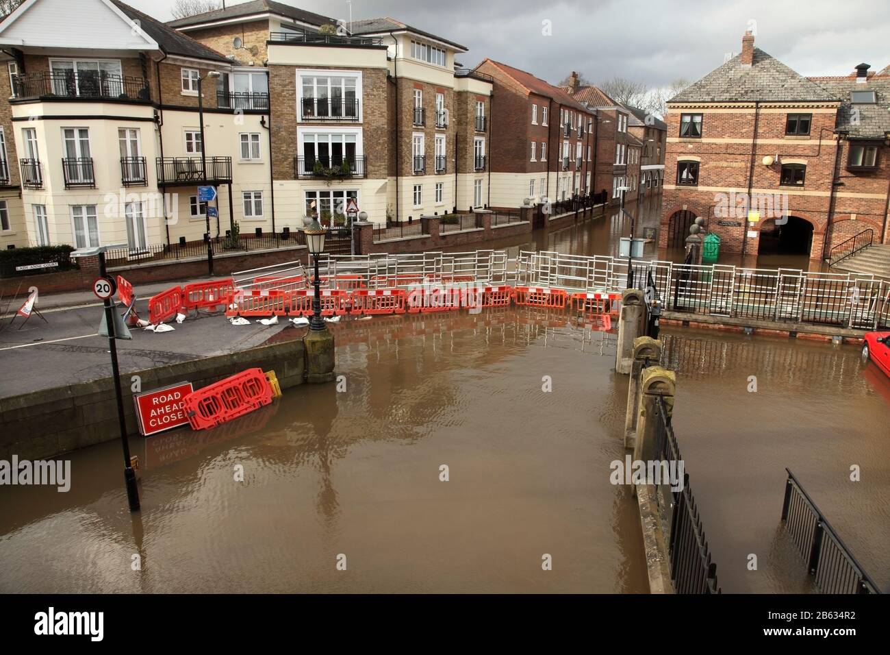 Temporary footbridge over flooding in March 2020 from the River Ouse at the junction of ...