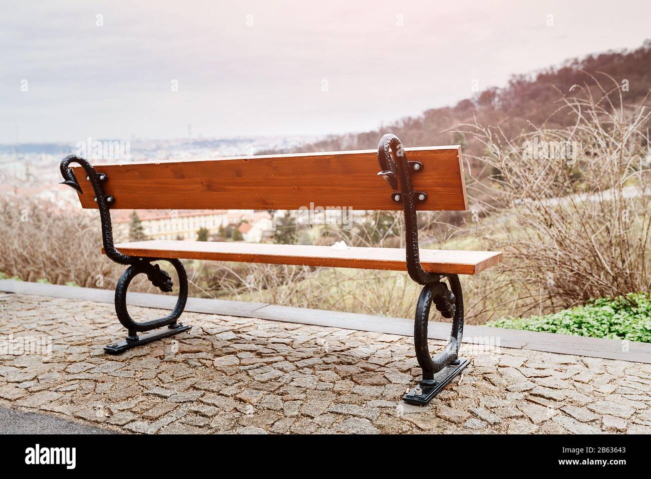 sightseeing bench in spring park Stock Photo - Alamy