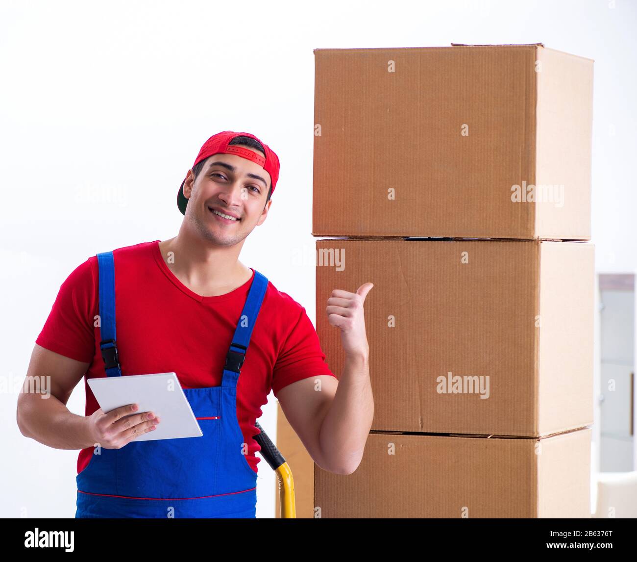 The contractor worker moving boxes during office move Stock Photo - Alamy