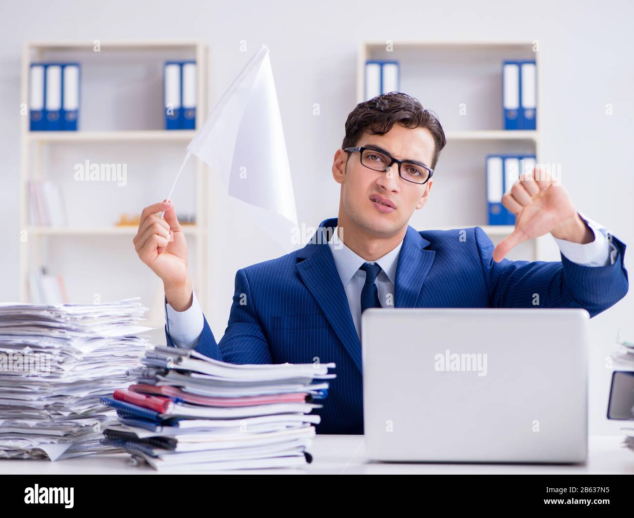 The businessman throwing white flag and giving up Stock Photo - Alamy