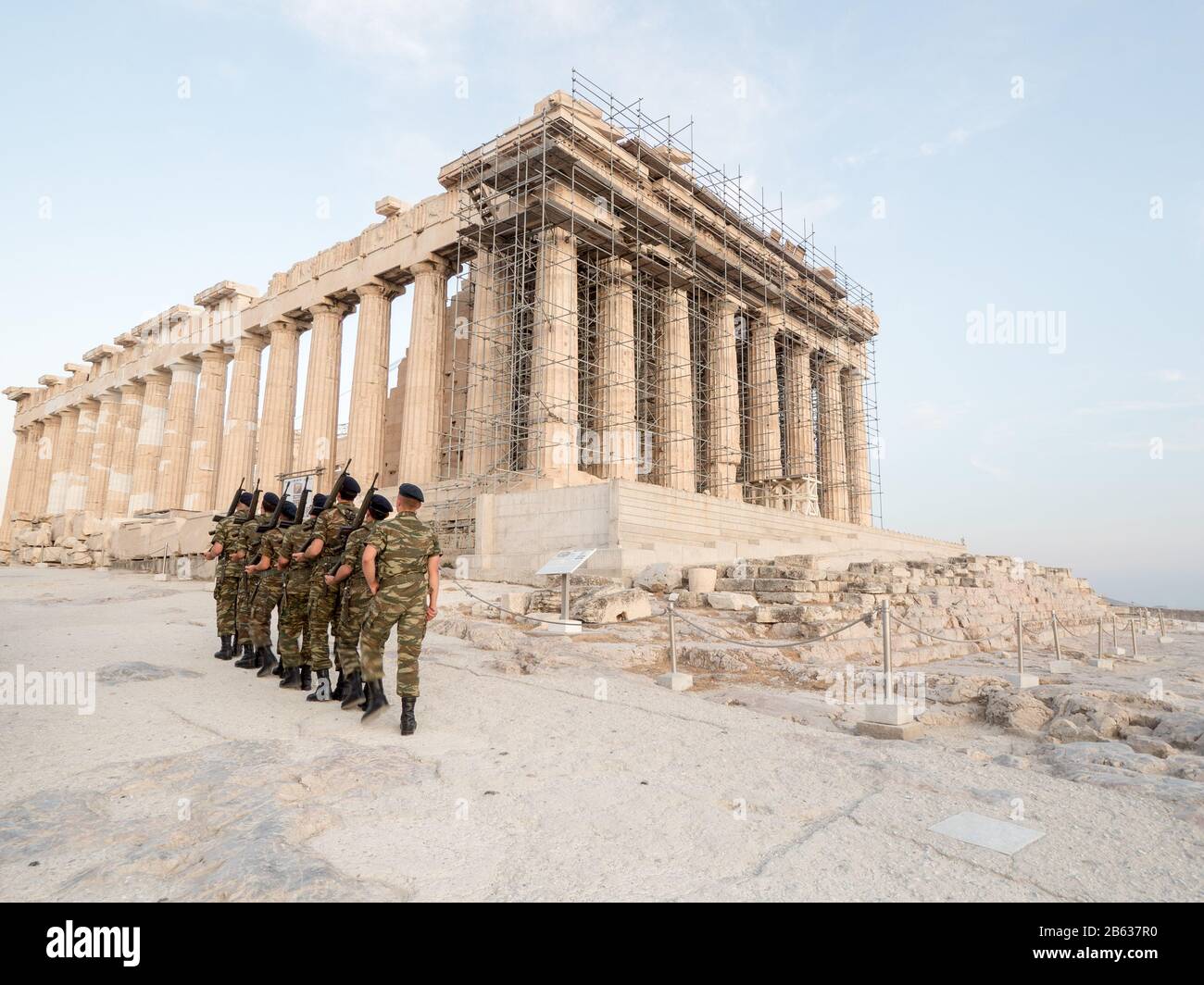 Military units walk over acient monument of Parthenon, Athenian ...