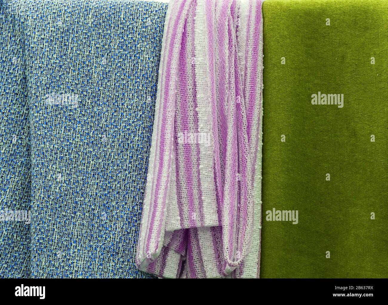 Colorful folded textile and fabric texturs in a close up view Stock ...