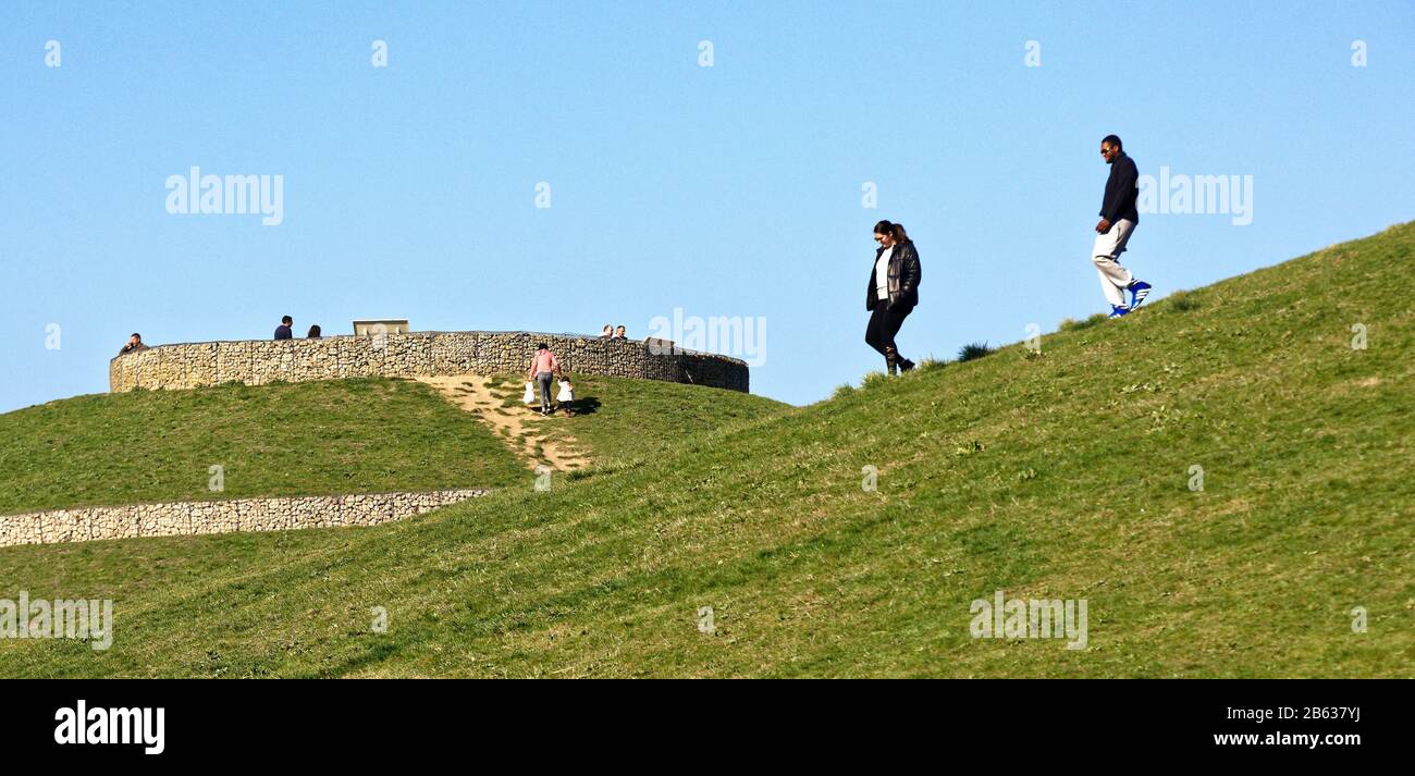 Walkers on the mounds of Northala Park, Northolt, London Stock Photo ...