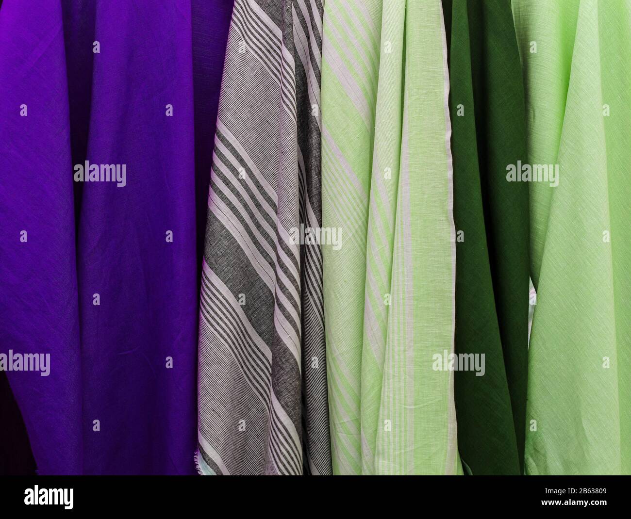Colorful folded textile and fabric texturs in a close up view Stock ...