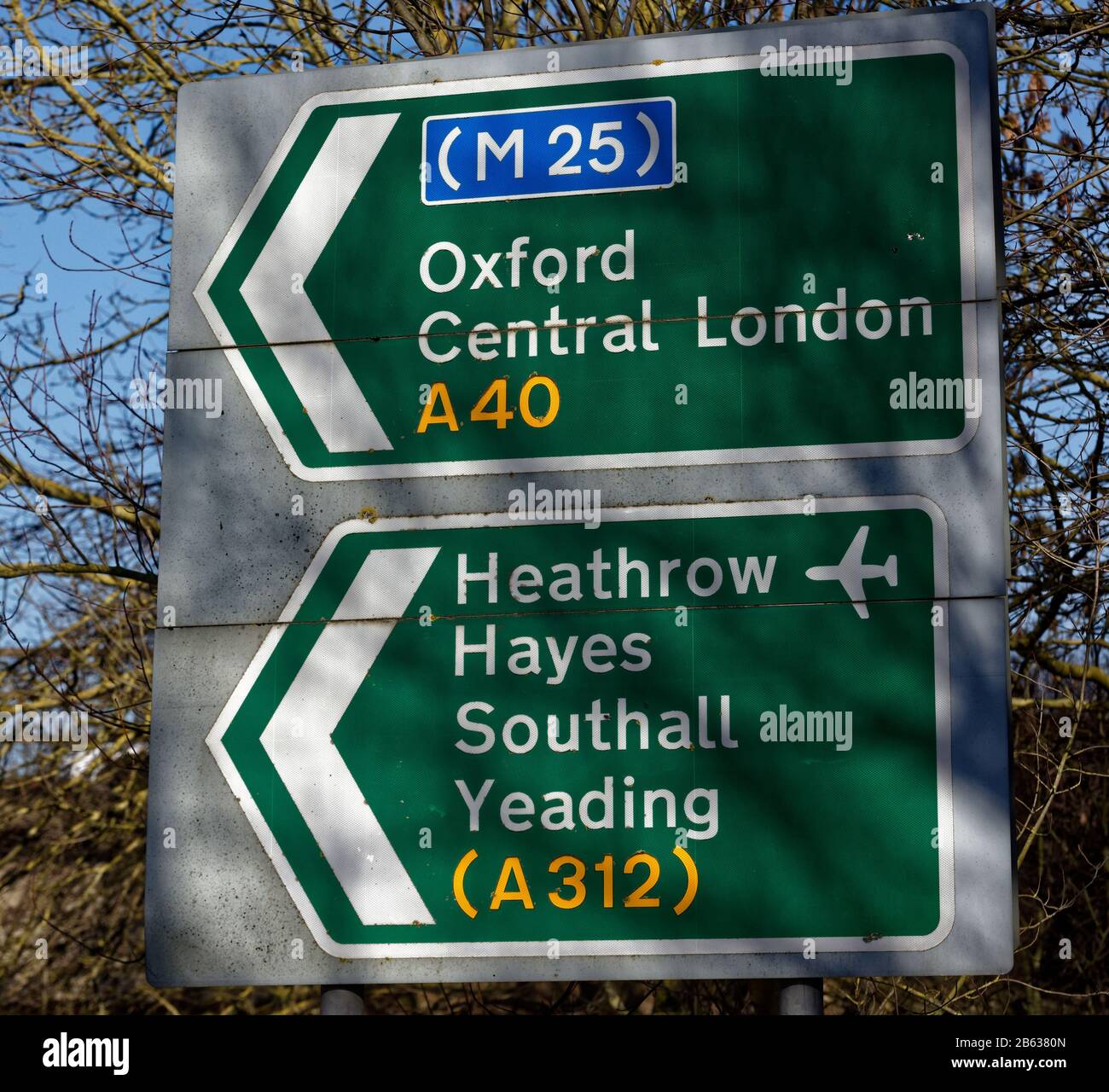 Road sign pointing to the A40 to lead to the M25 motorway or Central ...