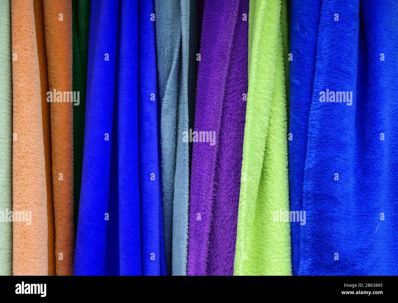 Colorful folded textile and fabric texturs in a close up view Stock ...
