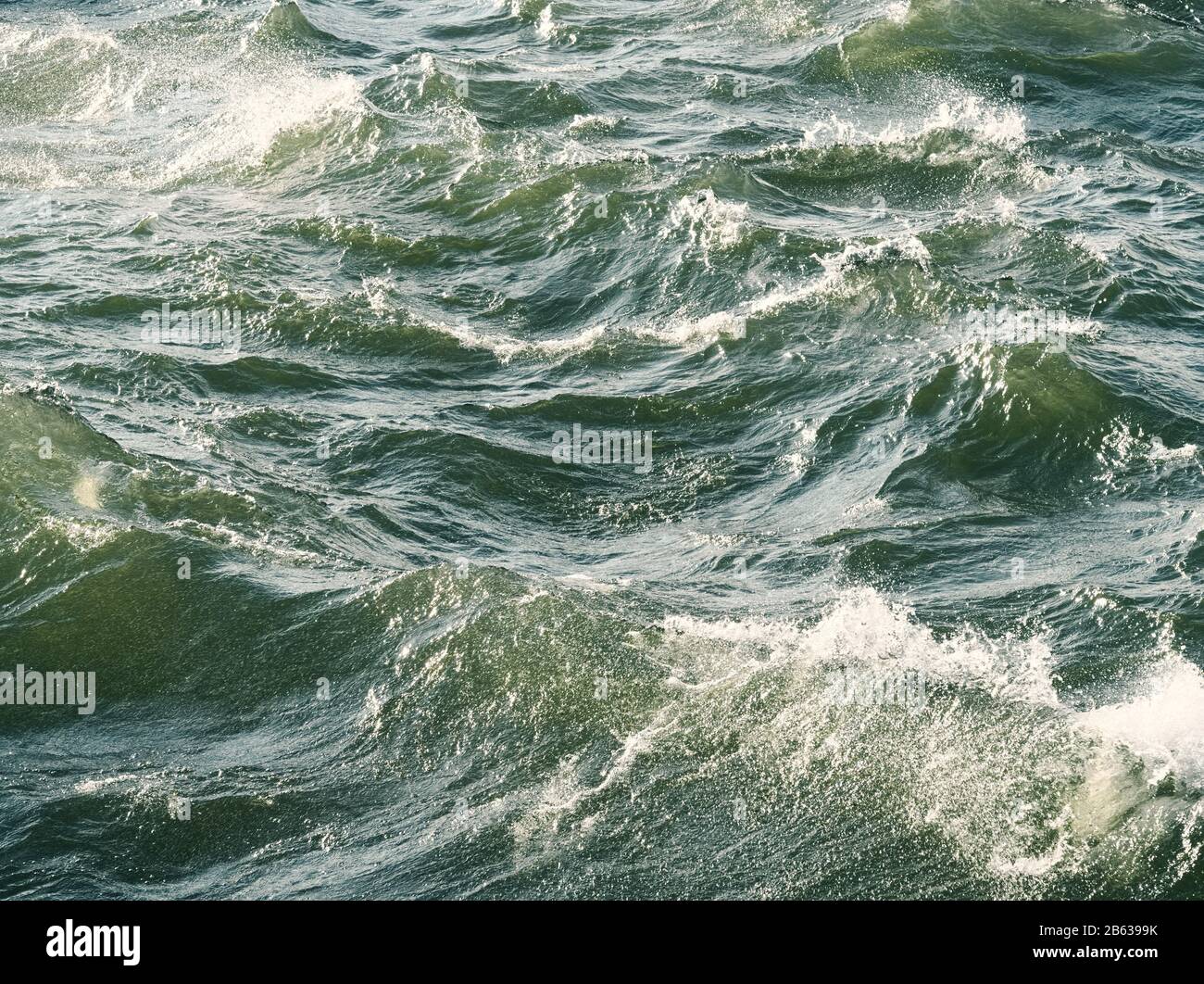 Greenish Water Surface with Stormy Waves Closeup Stock Photo - Alamy